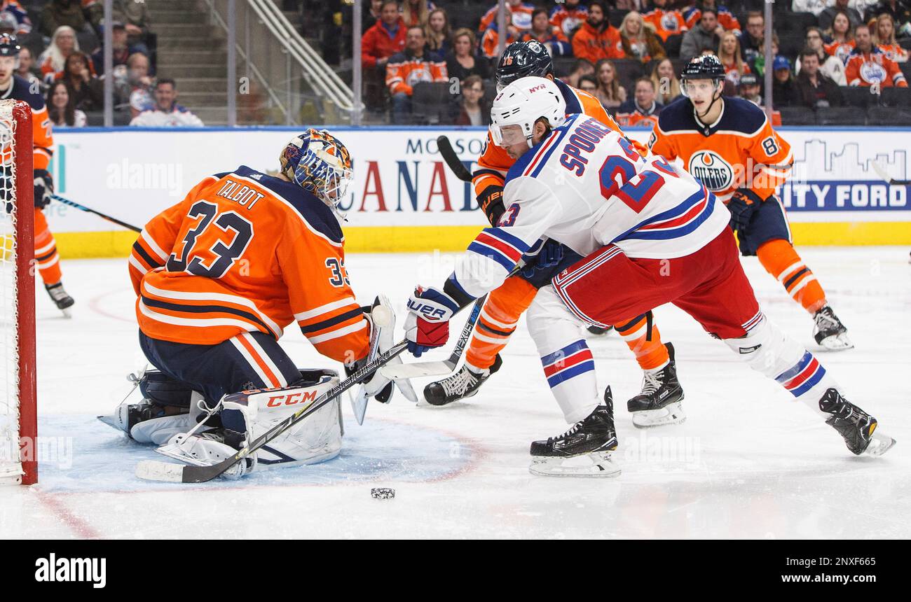 New York Rangers' Ryan Spooner (23) is stopped by Edmonton Oilers ...