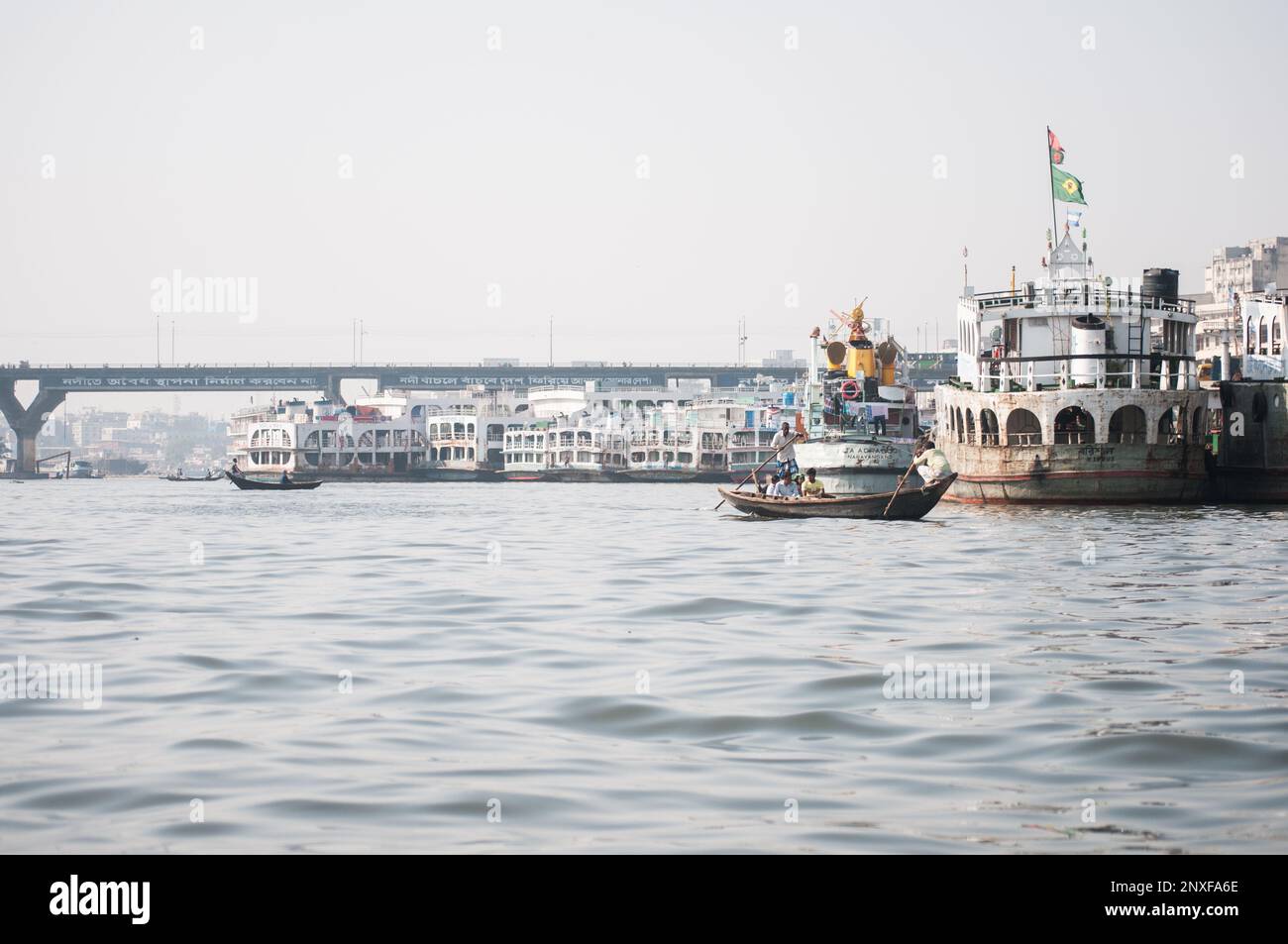 Picture of Boat on the water in Sadarghat and roadside view. Some ...