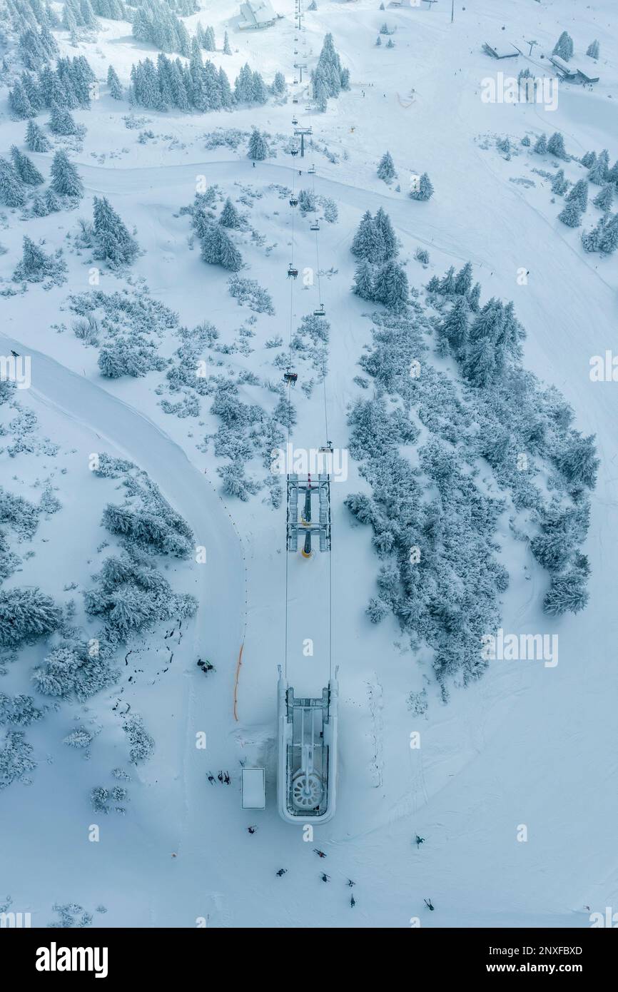 chair lift from above in fresh snowy winter in tourist ski resort Stock ...