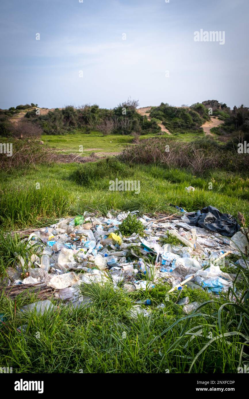 Vertical İmage, litter plastic in the nature. Pollution of the ...