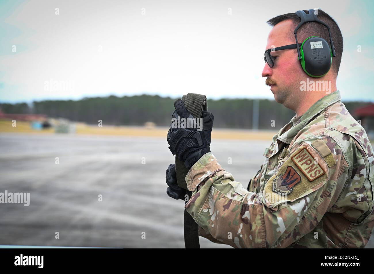 A U.S. Air Force weapons specialist from the 175th Maintenance Group ...