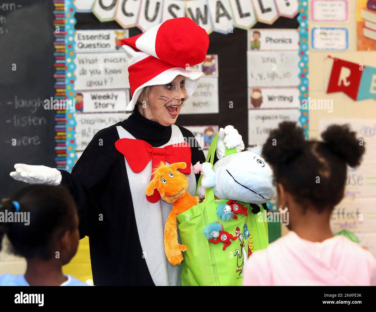 Linda Bunch, a library associate at Braswell Memorial Library, greets ...
