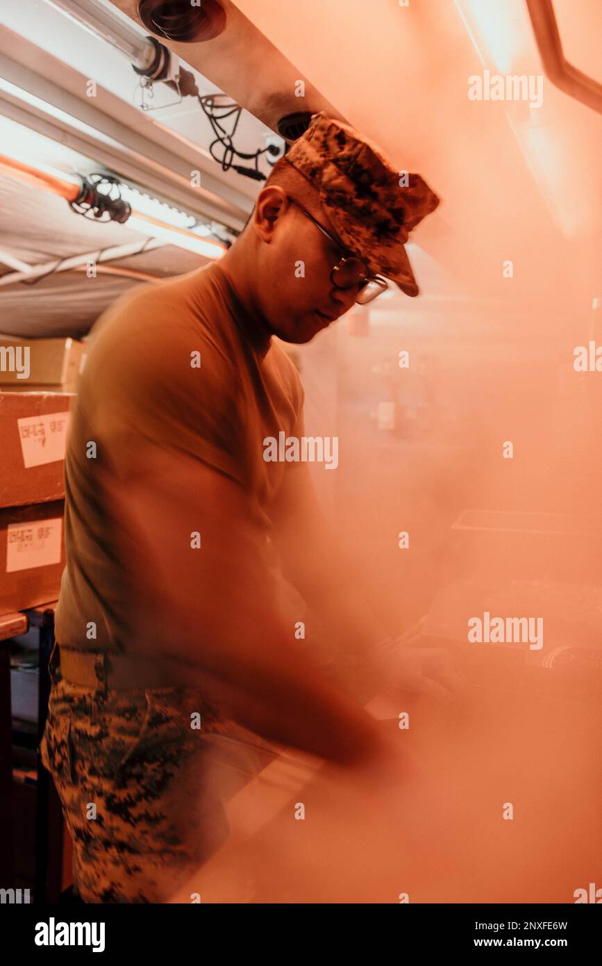 U.S. Marine Corps Lance Cpl. Ralphloren Abejo, a food service ...