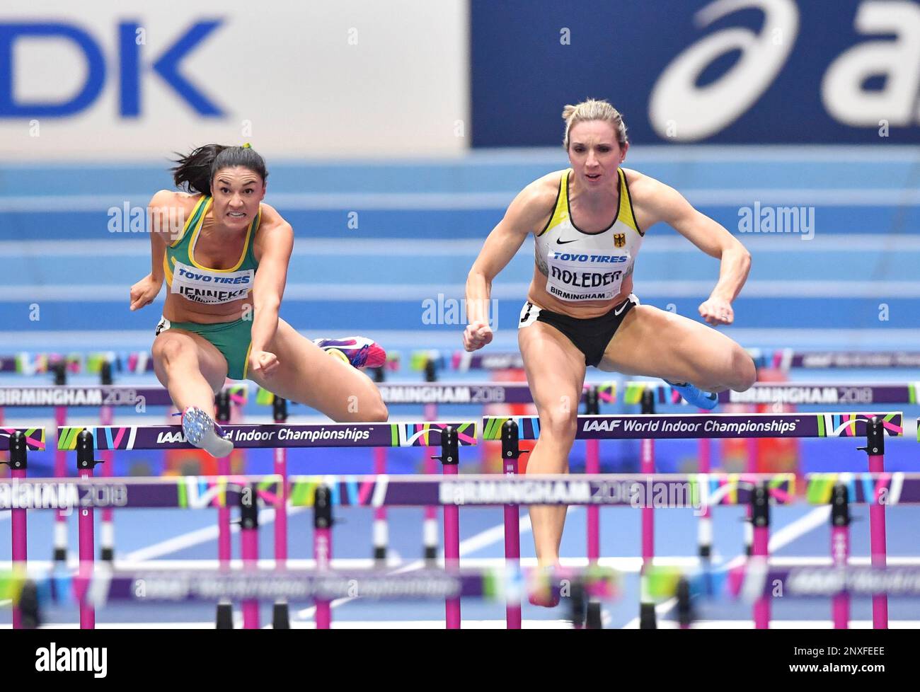 Cindy Roleder (GER) and Michelle Jenneke (AUS) runs their heat of the ...