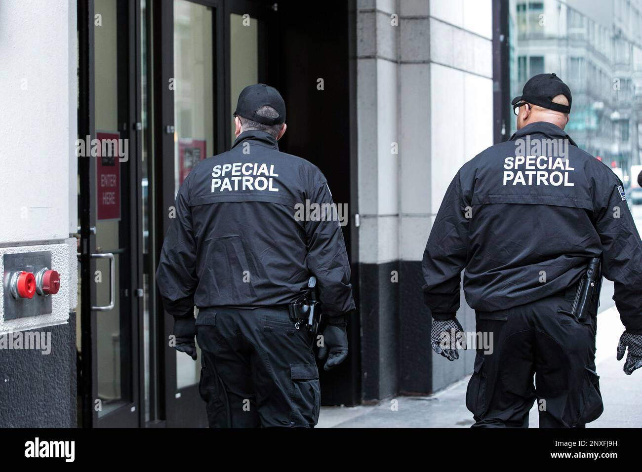 Two armed private security guards, hired by the Chicago Loop Alliance ...