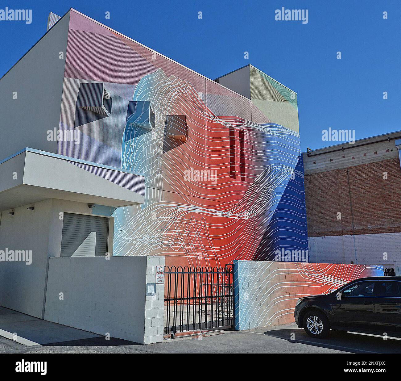 A giant mural painted by the renowned artist MOMO adorns the west ...