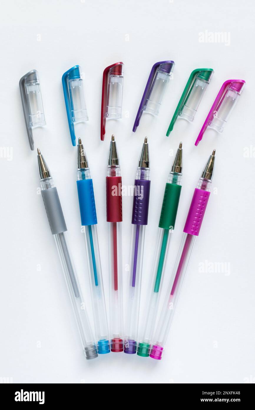 Set of colorful gel pens with open pen caps on white background Stock ...