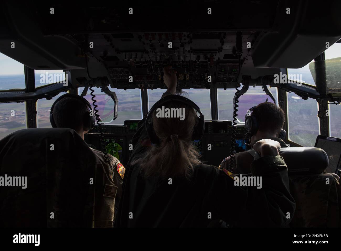 U.S. Air Force Maj. Kyle Gauthier, right, 37th Airlift Squadron pilot ...