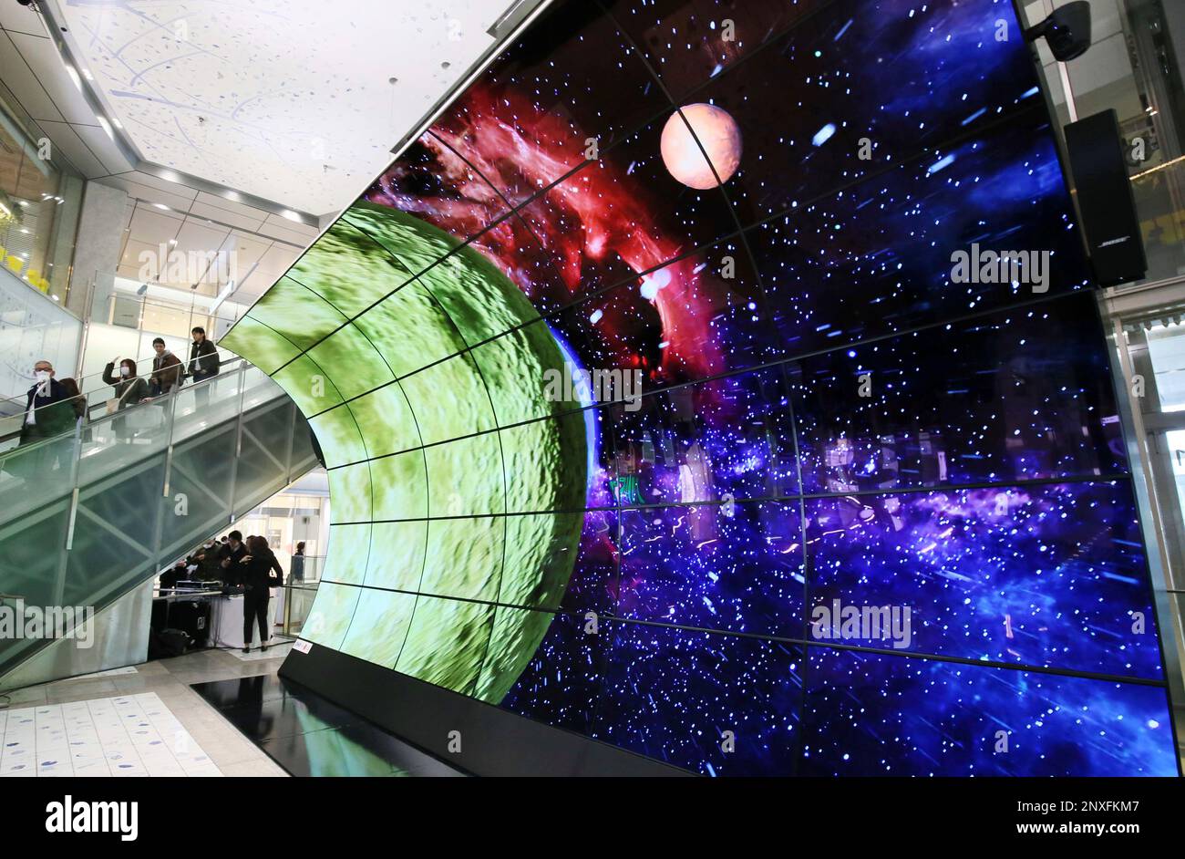Extra large digital signage using organic EL panel shows a test ...
