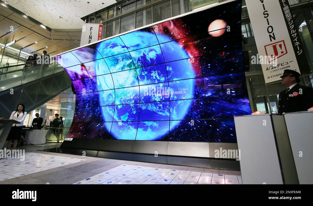 Extra large digital signage using organic EL panel shows a test ...