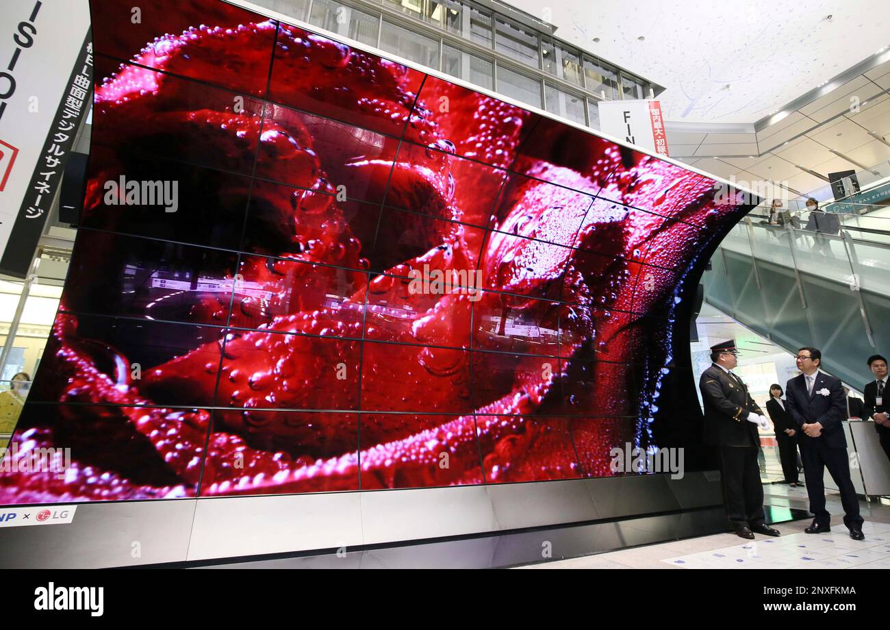 Extra large digital signage using organic EL panel shows a test ...