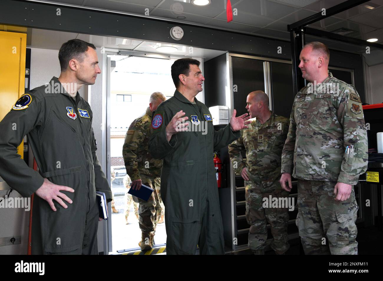 From left: U.S. Air Force Col. Christopher Clark, commander,144th Fighter Wing, California ...