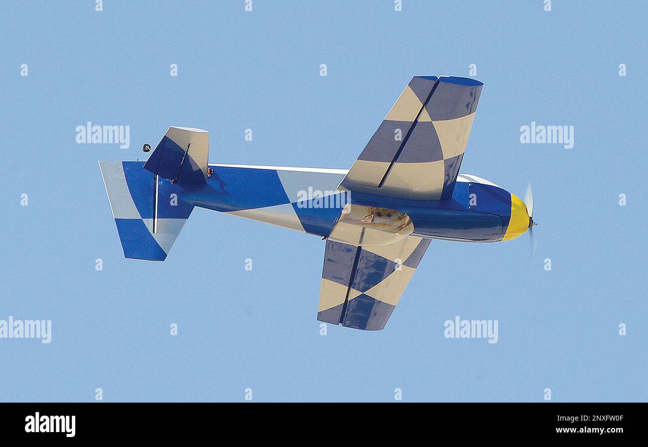 Ron Knittle's AJ Slick radio-controlled model airplane makes an upside ...