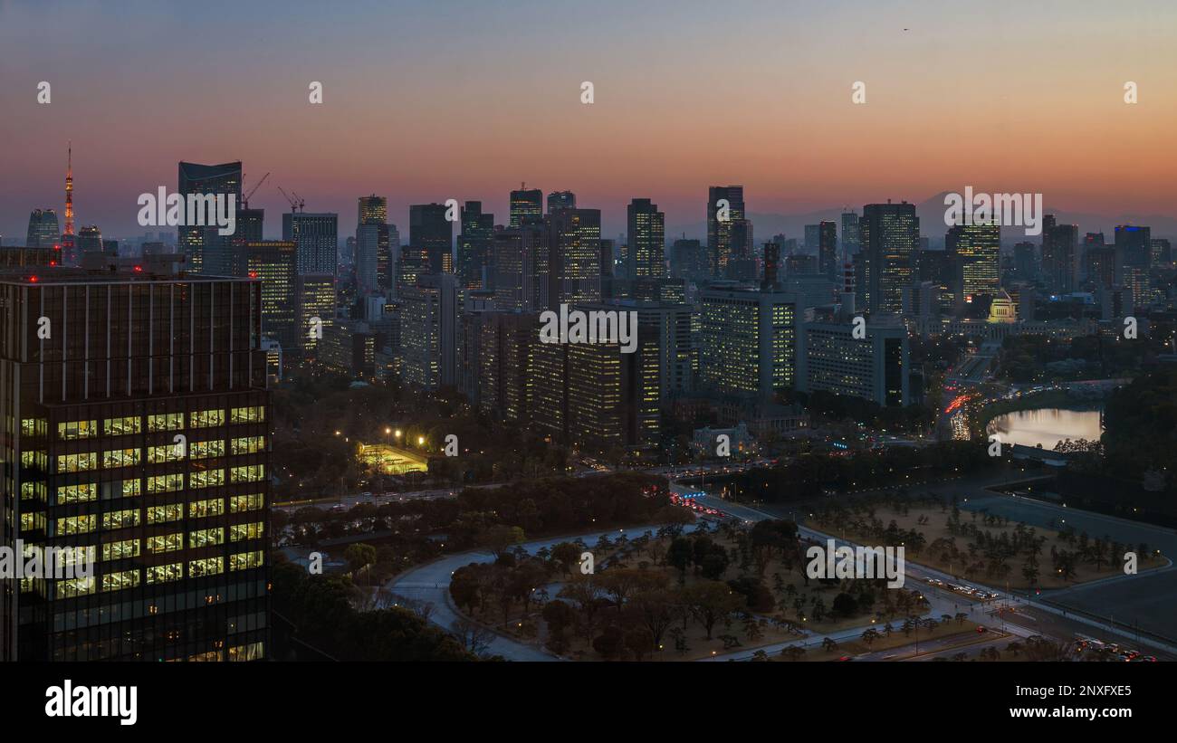 Sunset in Tokyo. View of the city center with the Imperial Palace ...