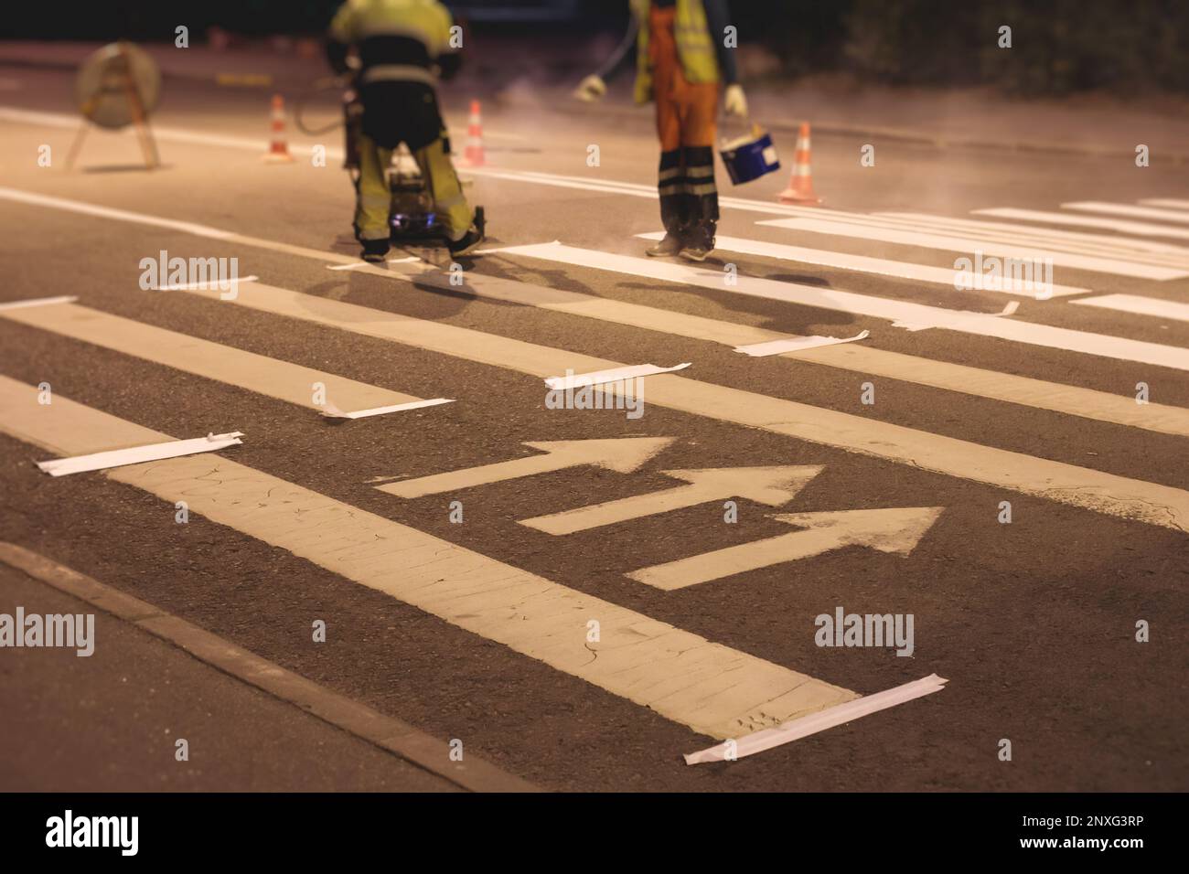 Process of making new road surface markings with a line striping ...