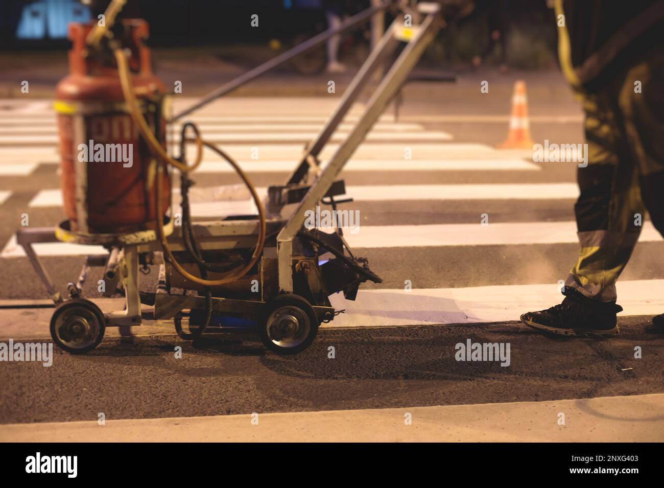 Process of making new road surface markings with a line striping ...