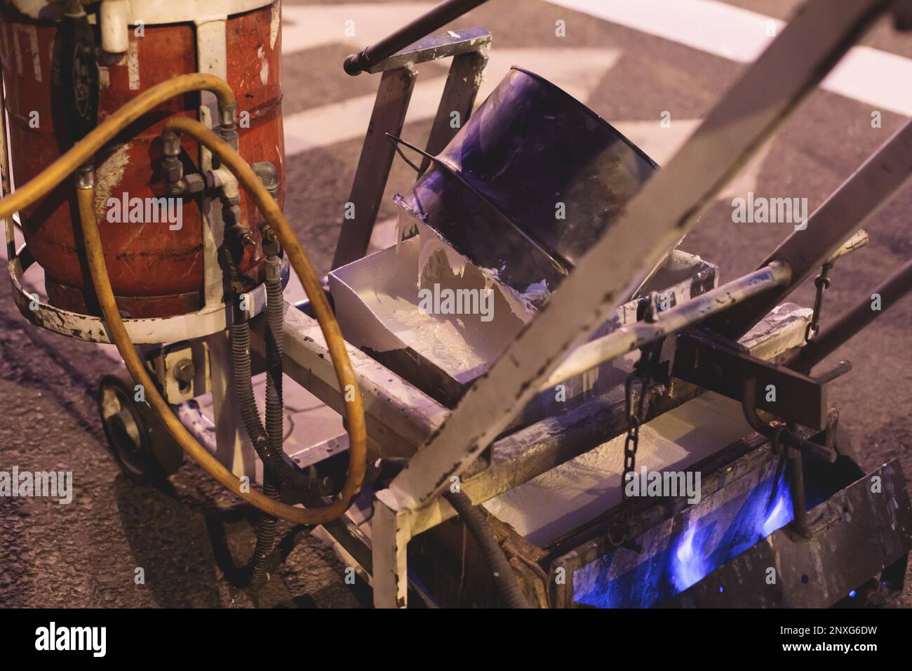 Process of making new road surface markings with a line striping ...