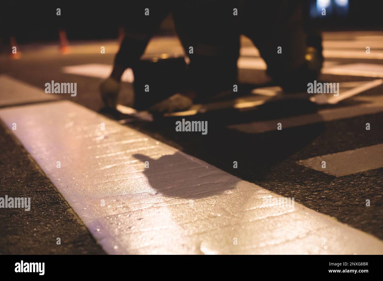 Process of making new road surface markings with a line striping ...