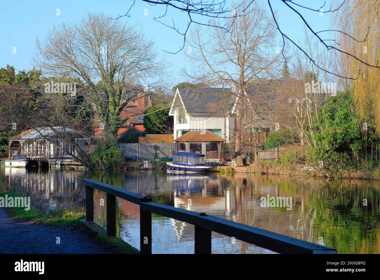 The peaceful and quiet backwater of the River Wey navigation canal at ...