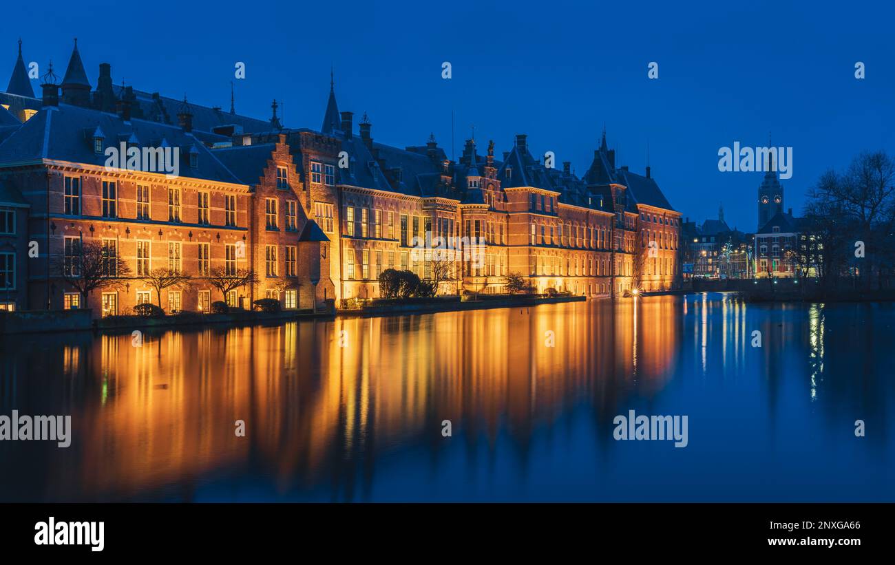 The Hague's Binnenhof with the Hofvijver lake at dusk, Den Haag ...