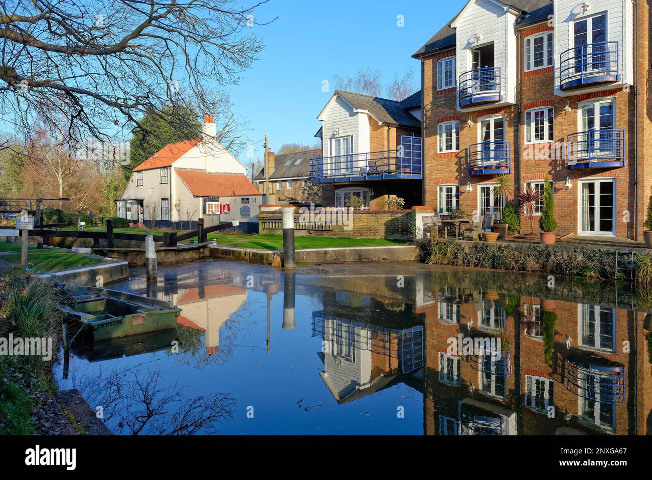 Modern waterside apartments developed from old industrial buildings on ...