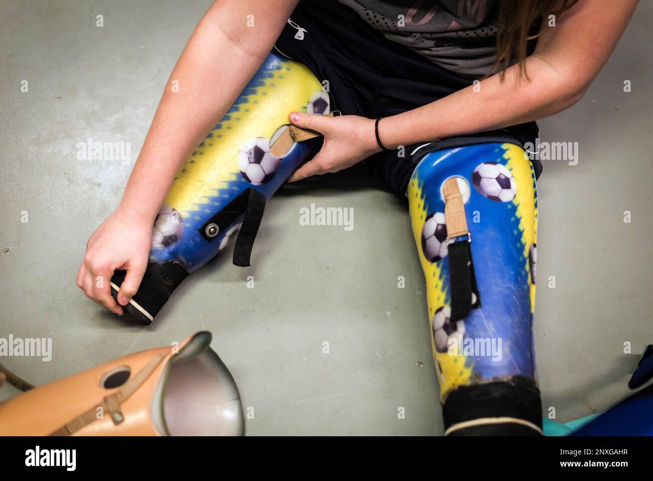 In this Monday, Jan. 22, 2018 photo, Danika Williams slides on one of ...