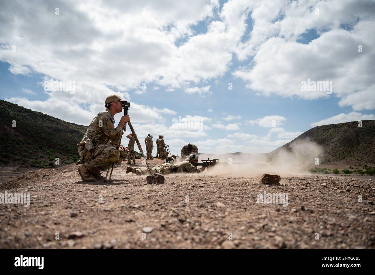 U.S. Army soldiers fire a sniper rifle during an East Africa Response ...