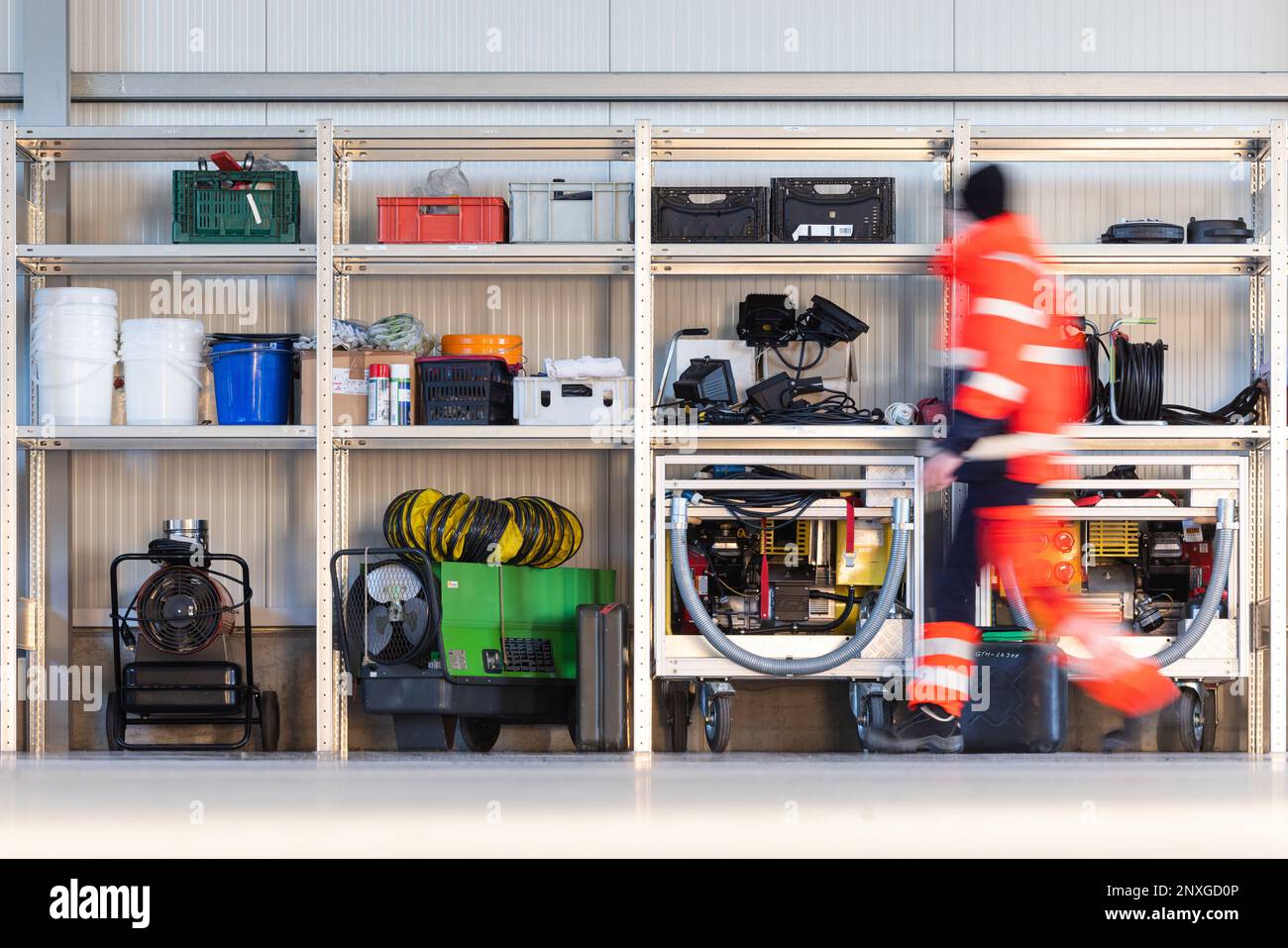 Gotha, Germany. 01st Mar, 2023. A disaster relief worker walks past the ...