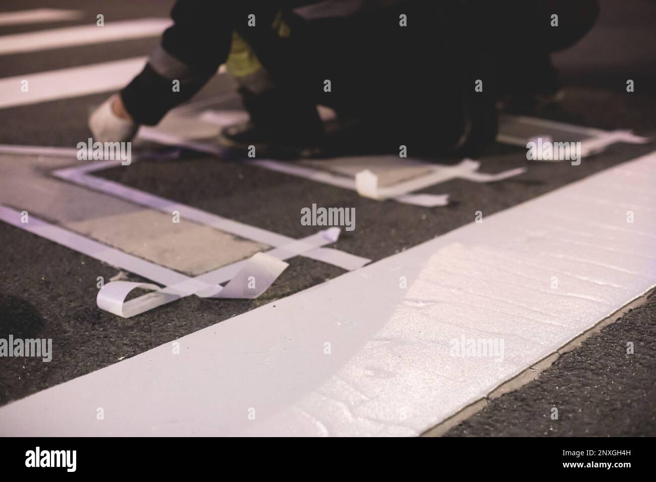 Process of making new road surface markings with a line striping ...