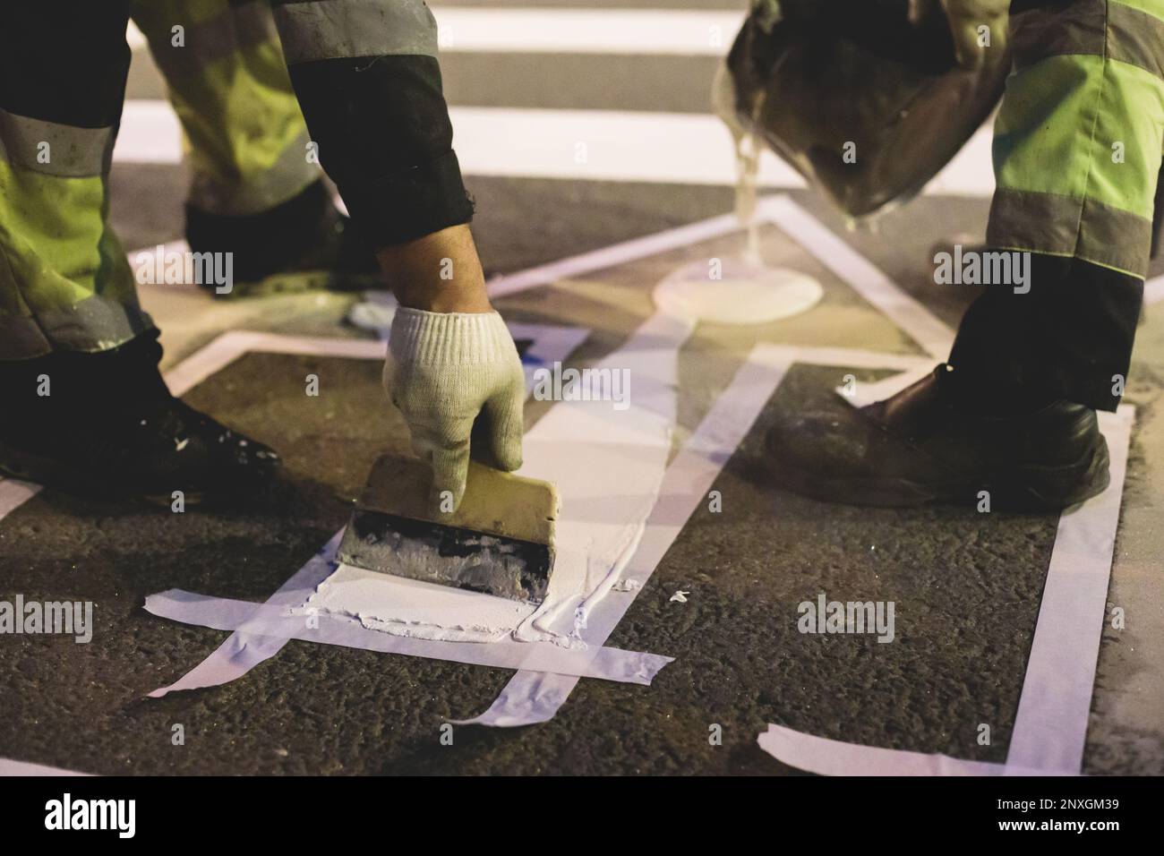 Process of making new road surface markings with a line striping ...