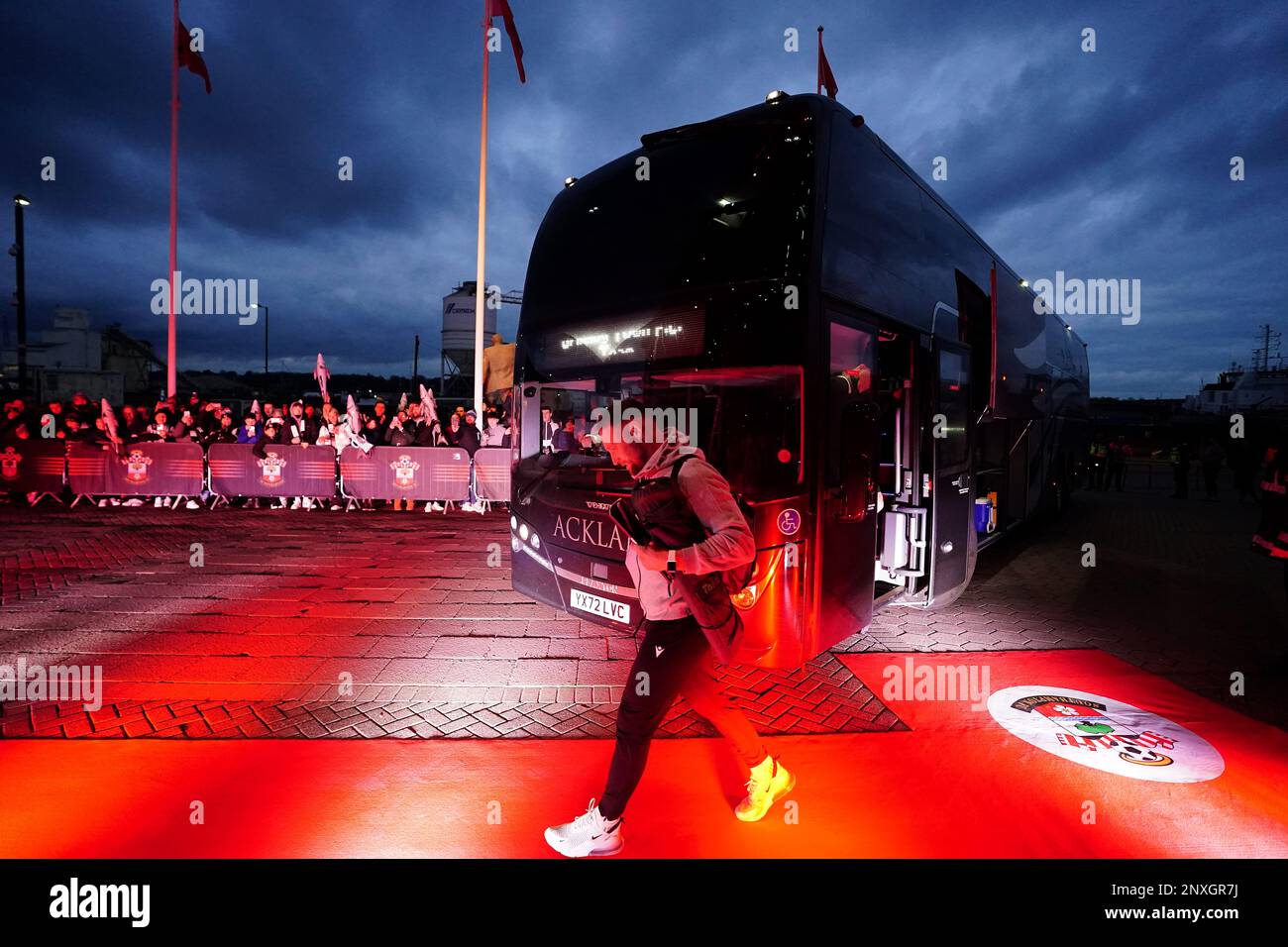 Fans wait as the Grimsby Town team bus arrives at the ground ahead of ...
