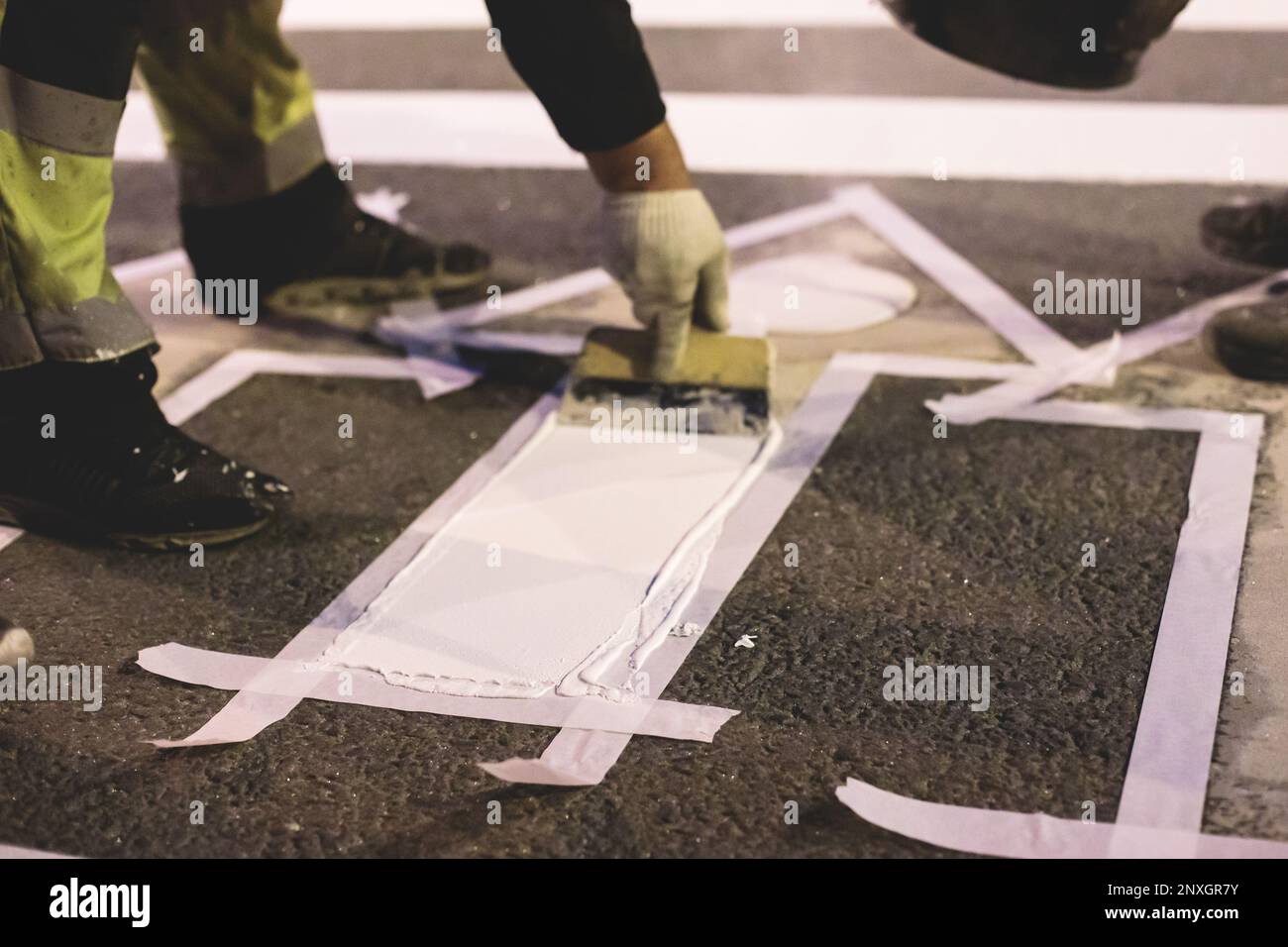 Process of making new road surface markings with a line striping ...