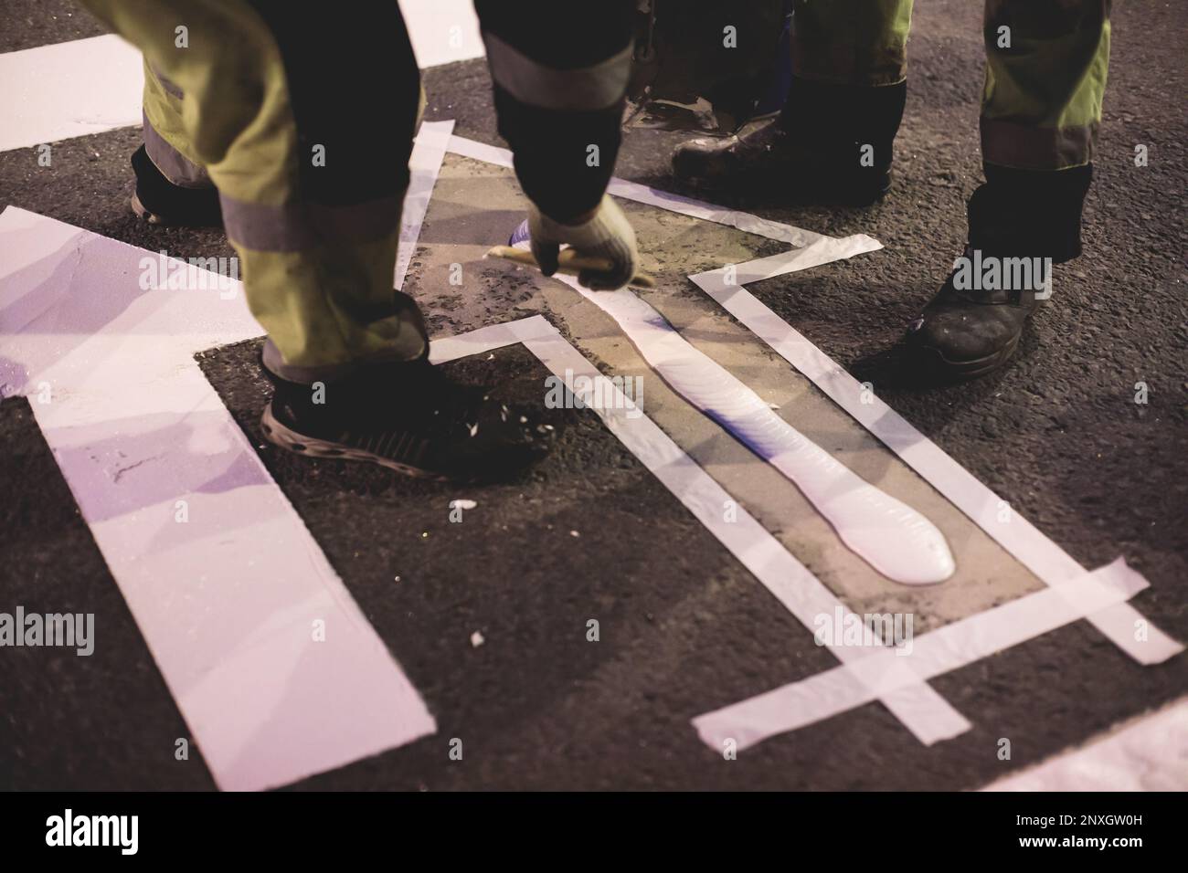 Process of making new road surface markings with a line striping ...