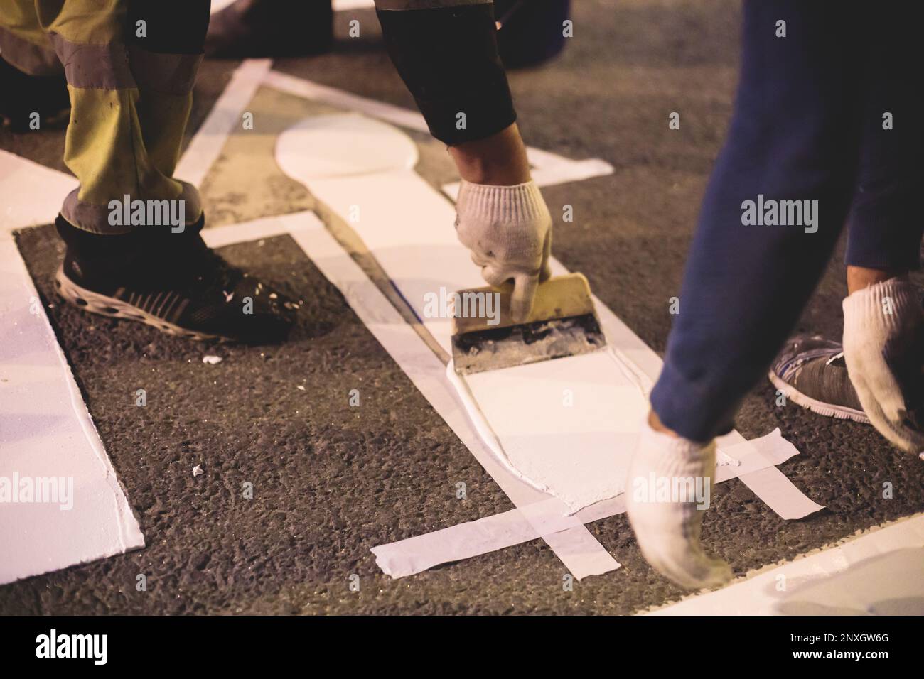 Process of making new road surface markings with a line striping ...