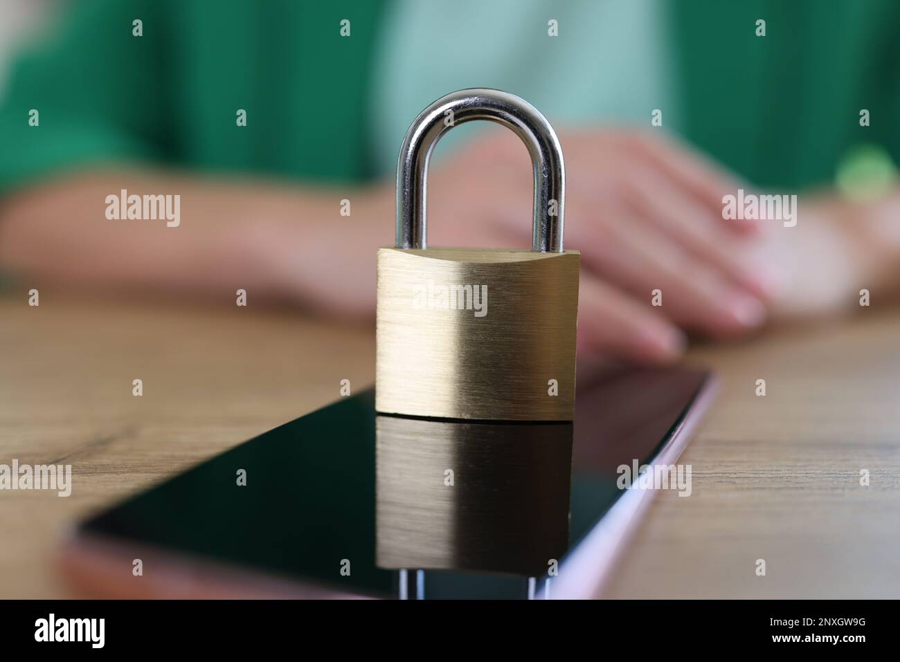 Closed metal padlock on modern smartphone, personal data protection ...