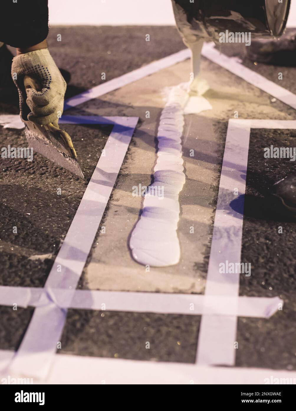 Process of making new road surface markings with a line striping ...