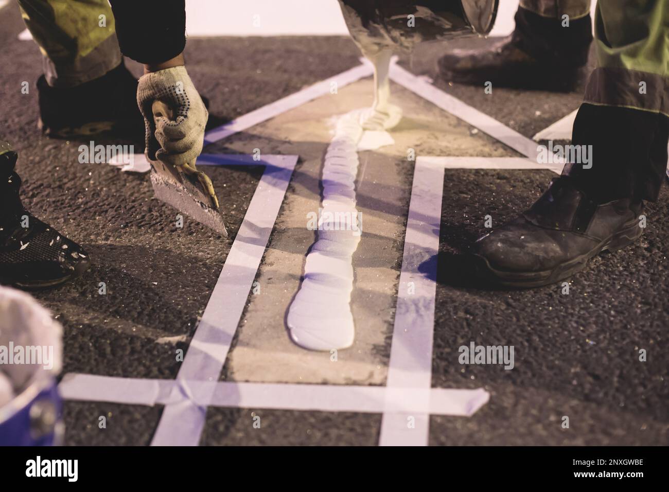 Process of making new road surface markings with a line striping ...