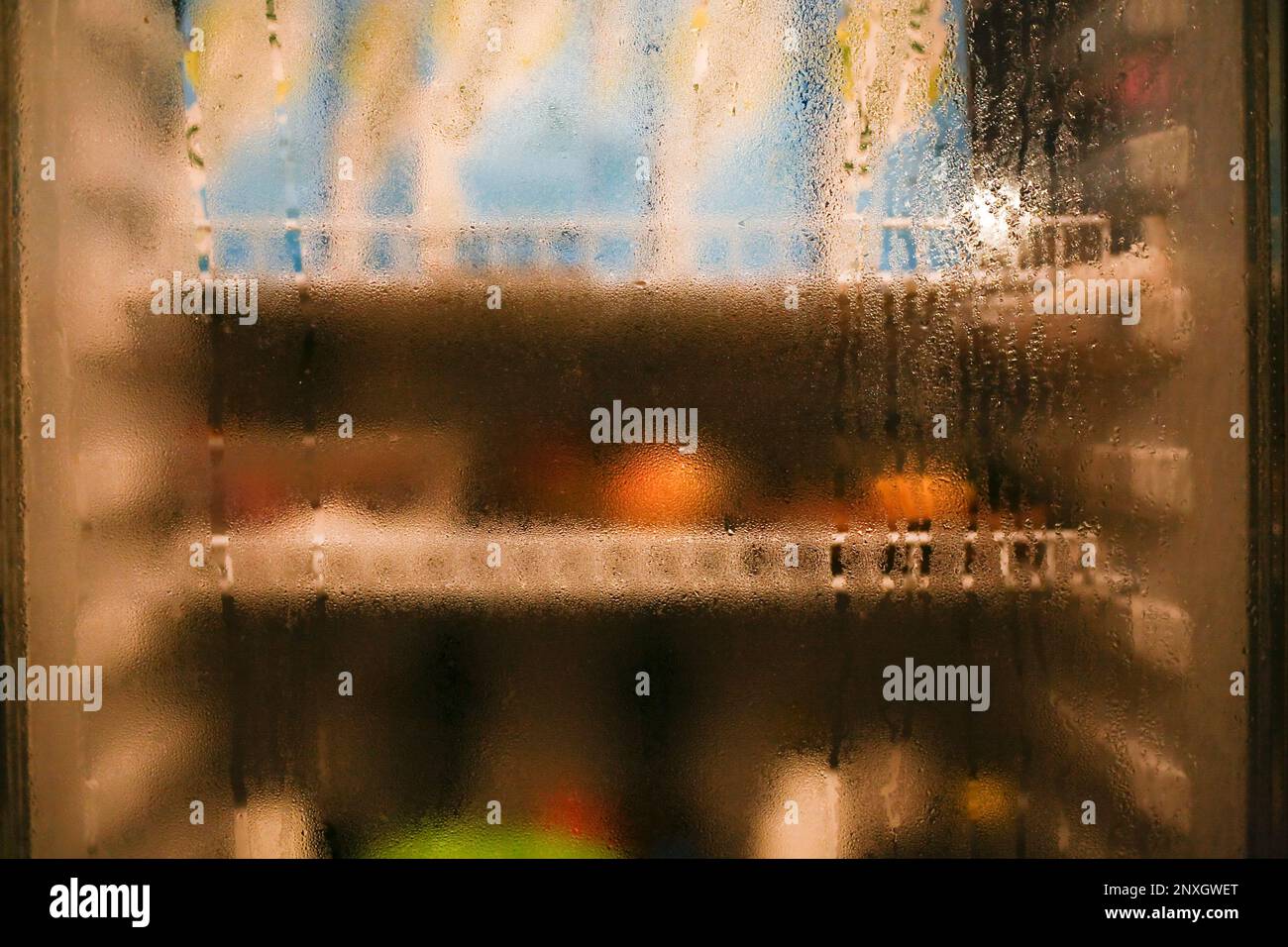 Close-up of water droplets on the glass of the refrigerator ...
