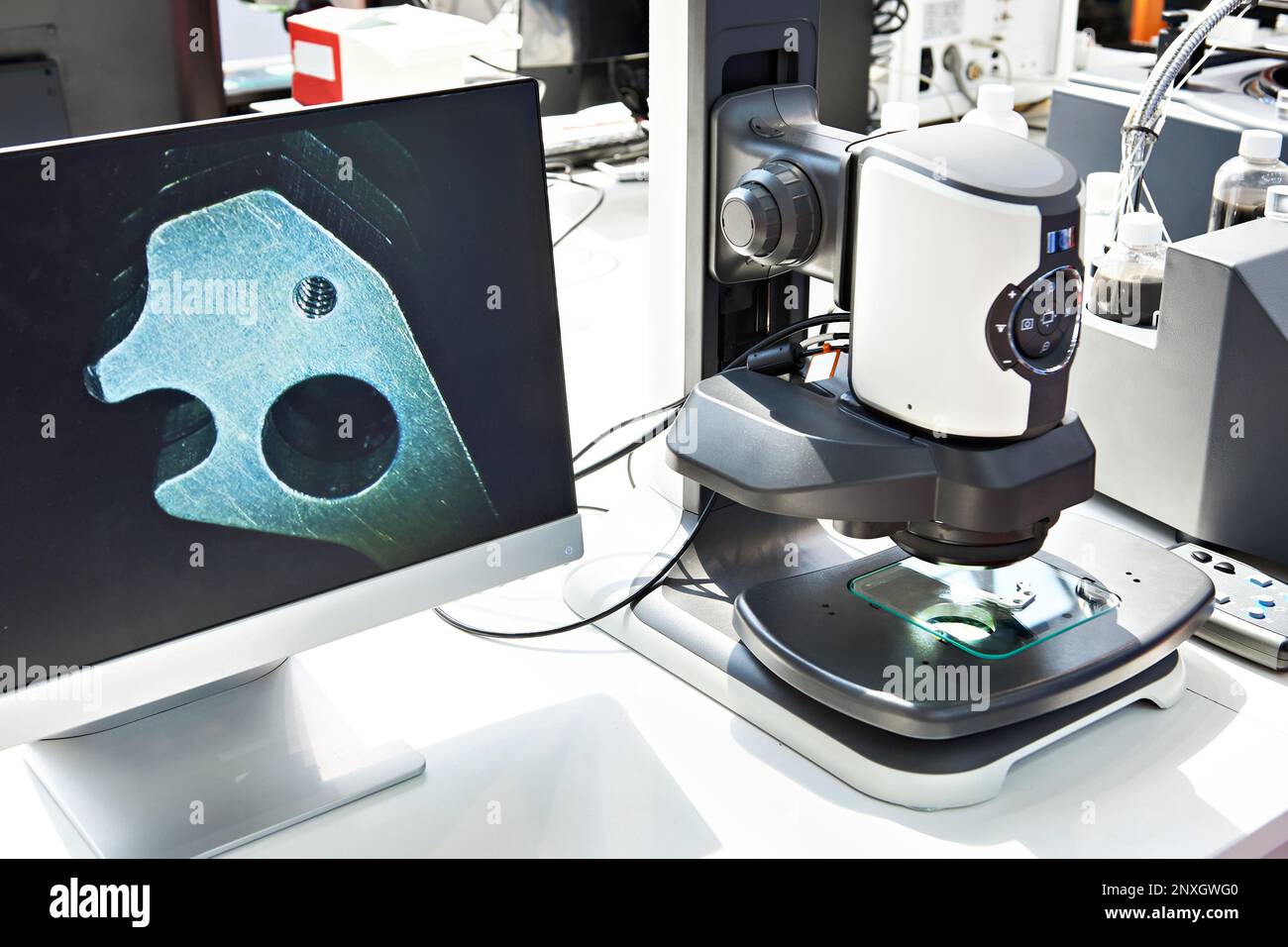 Digital microscope and monitor in the laboratory Stock Photo - Alamy