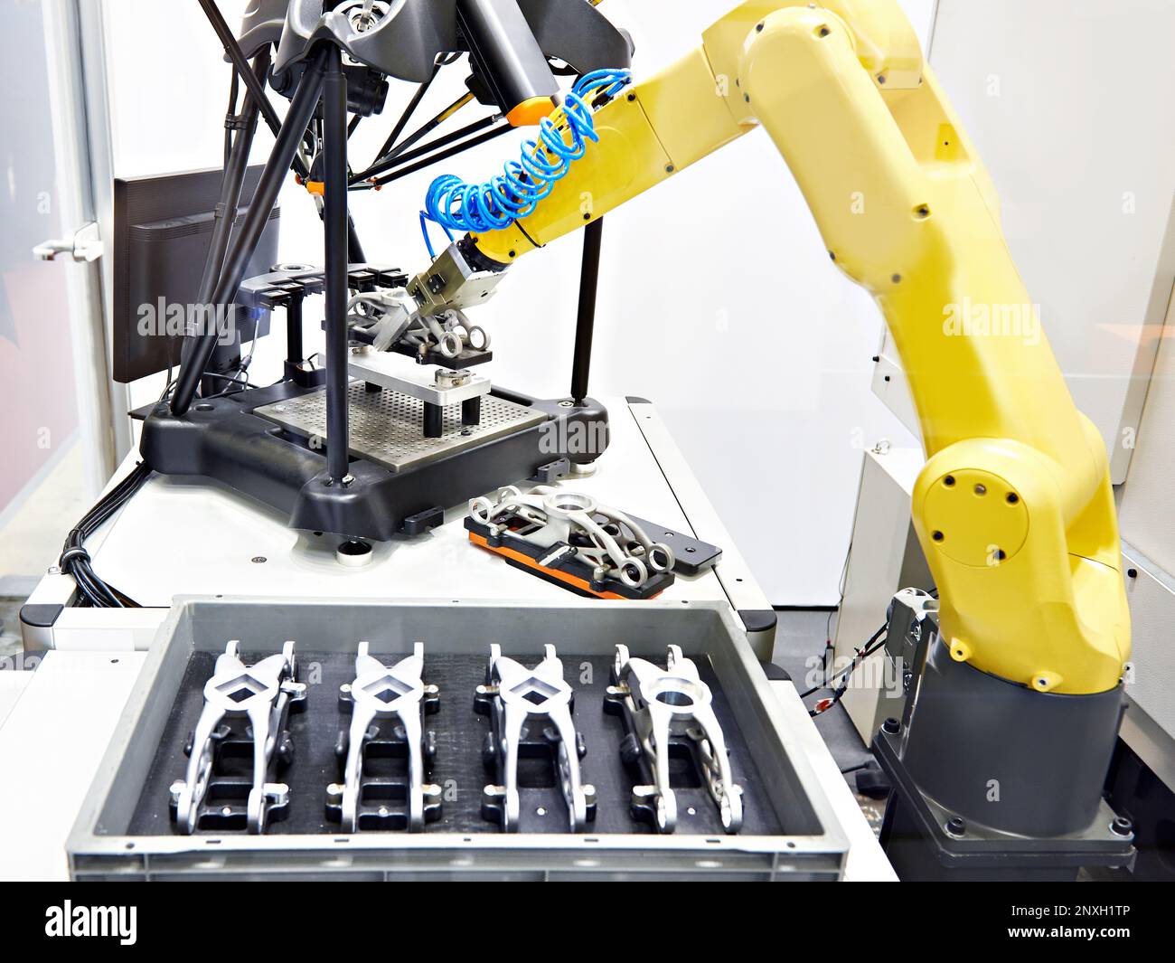 Robotic arm and measuring bench workpieces Stock Photo - Alamy