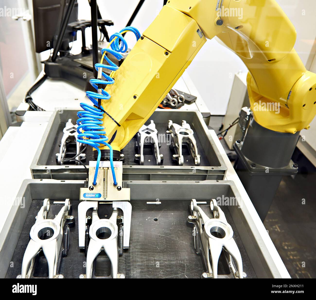 Robotic arm and measuring bench workpieces Stock Photo - Alamy