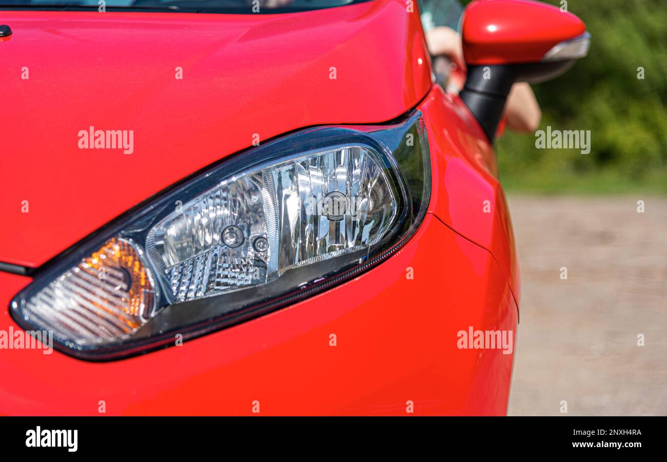 Front and headlight of a passenger car Stock Photo - Alamy