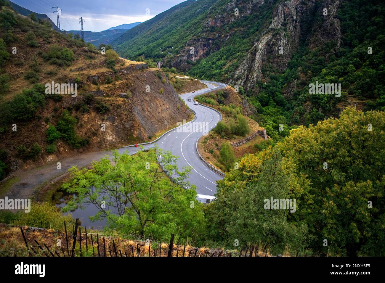 N116 road meandering and parallel to The Yellow Train or Train Jaune ...