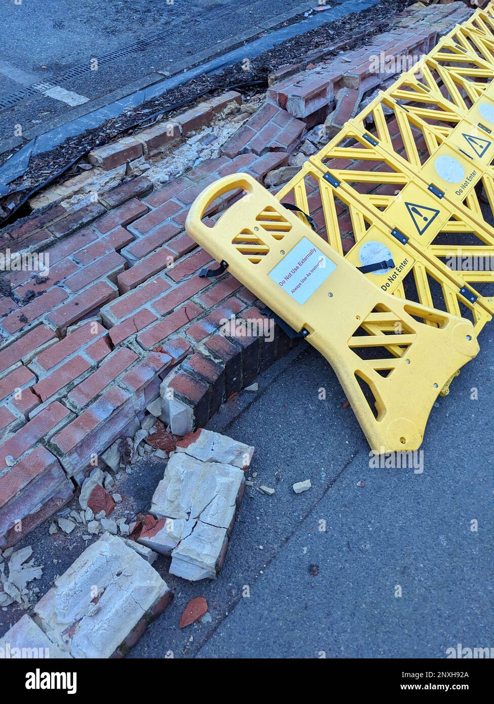 A Broken Wall in A Carpark Been Hit by a Car With Warning Barrier ...