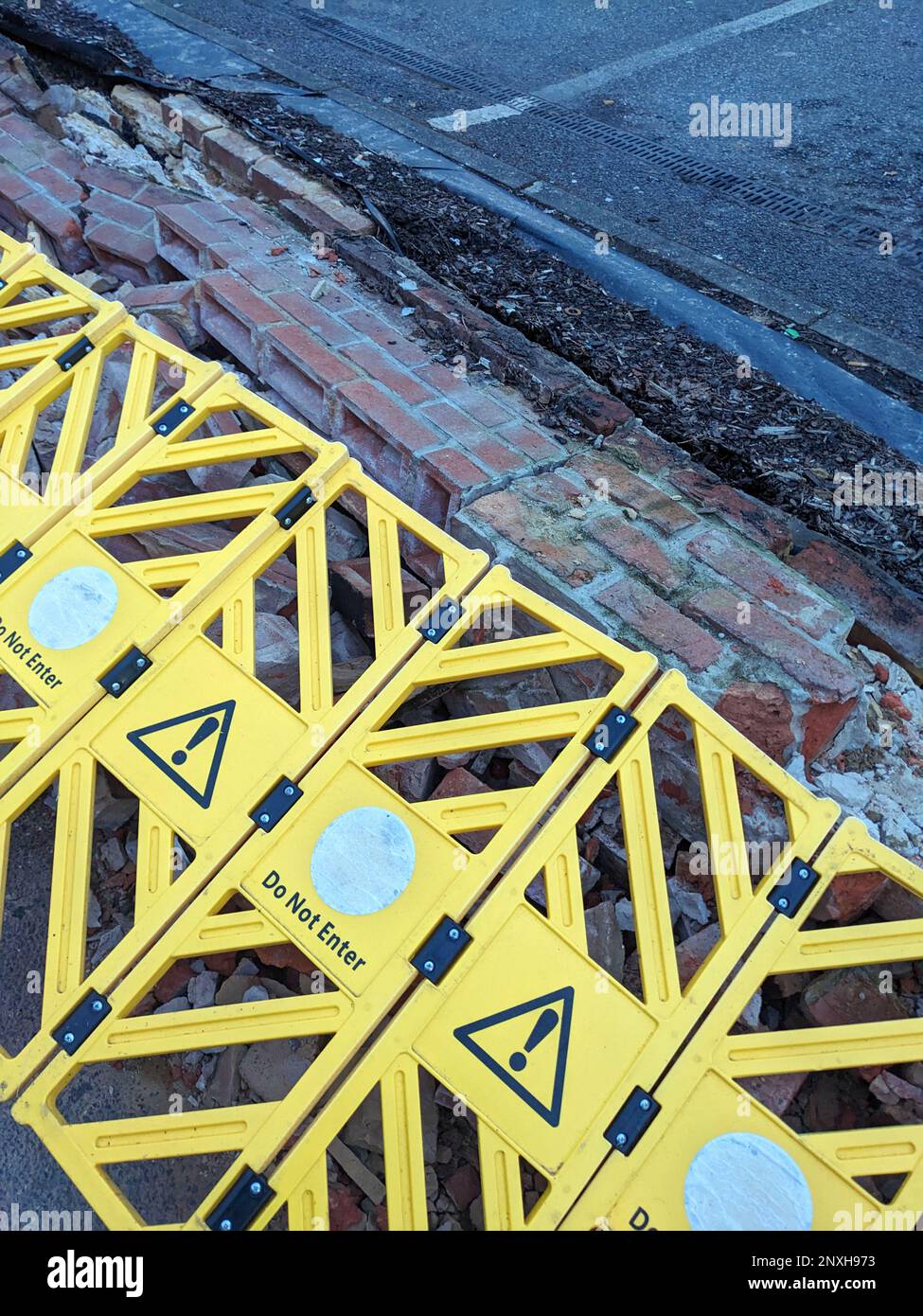 A Broken Wall in A Carpark Been Hit by a Car With Warning Barrier ...