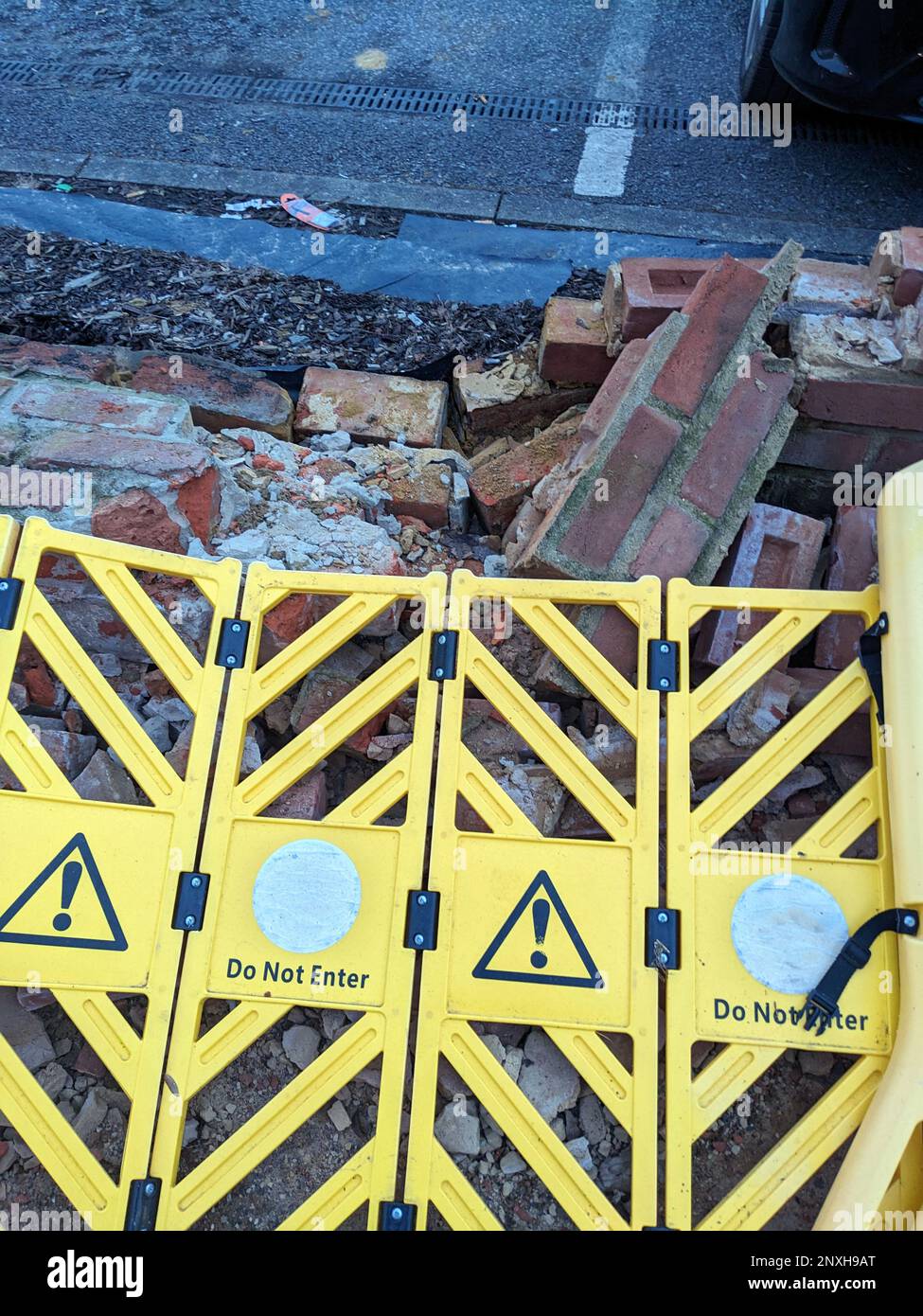 A Broken Wall in A Carpark Been Hit by a Car With Warning Barrier ...