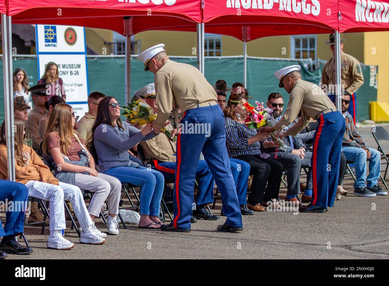 Guests of Capt. Mylen Morales and Capt. Alan Buck receive flowers ...