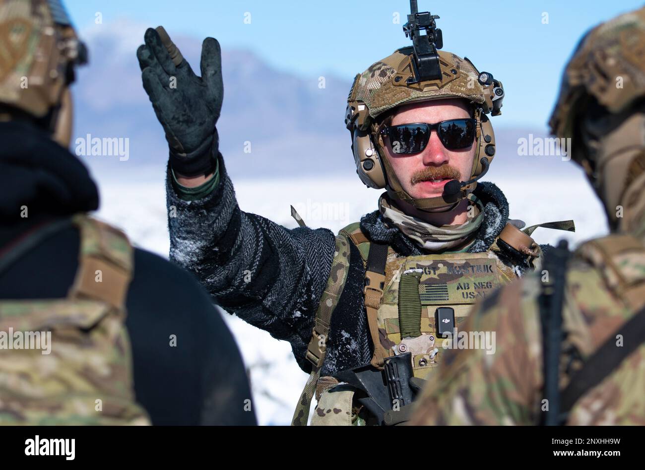 Technical Sergeant Aaron Kostiuk, 822d Base Defense Squadron, directs ...