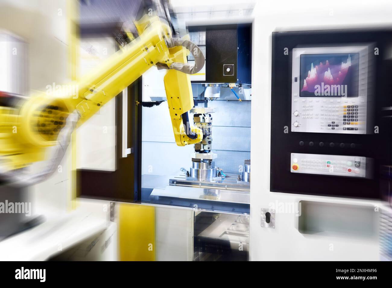 Robotic arm and vertical milling center with linear guides Stock Photo ...