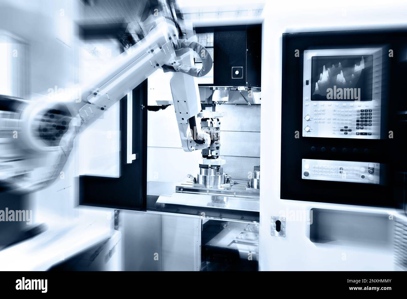Robotic arm and vertical milling center with linear guides Stock Photo ...